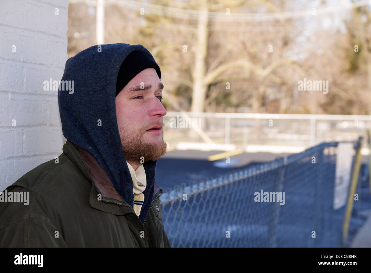 Homeless man cold winter day. Worried or lonely facial expression Stock ...
