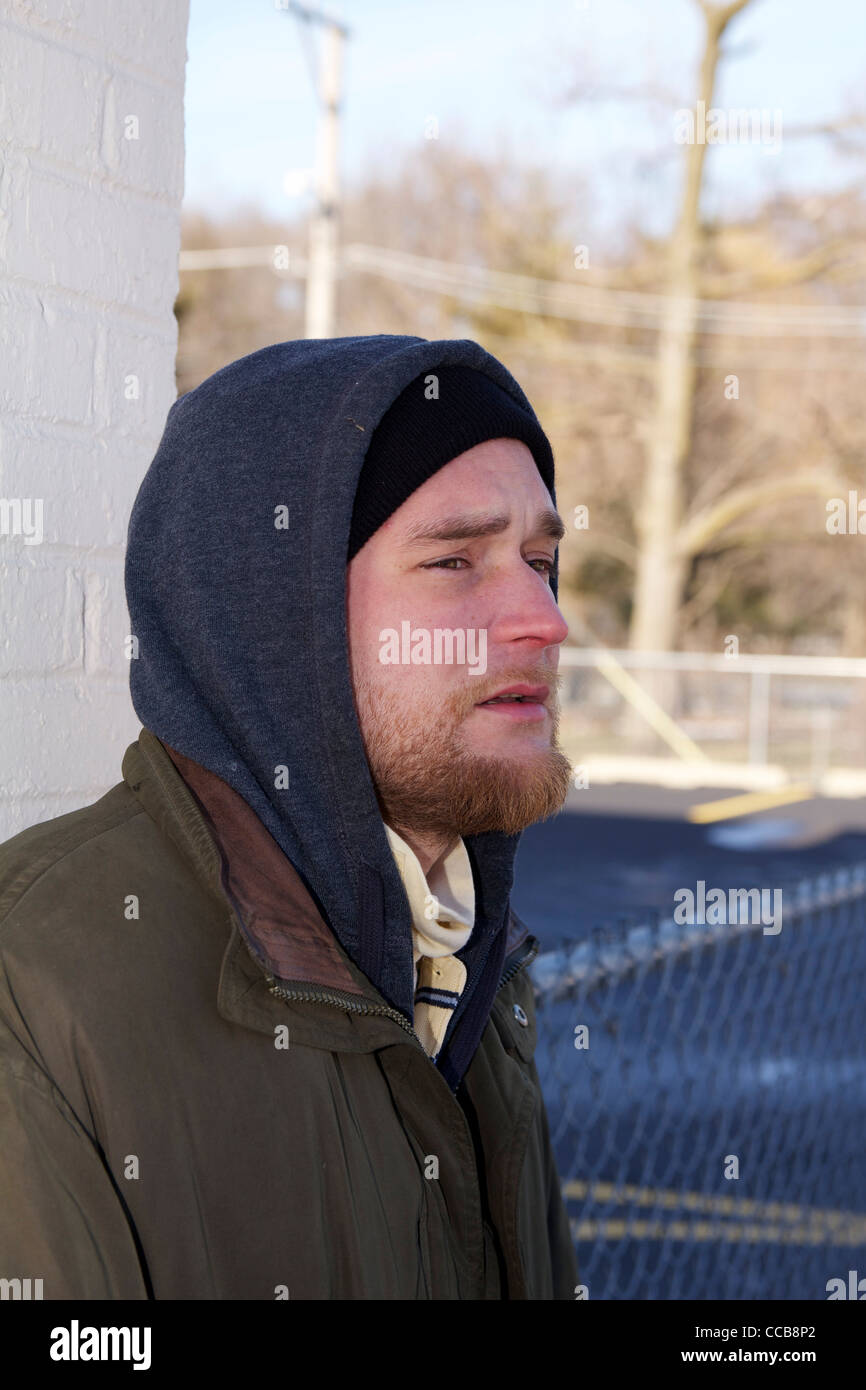 Homeless man cold winter day. Worried or lonely facial expression Stock ...