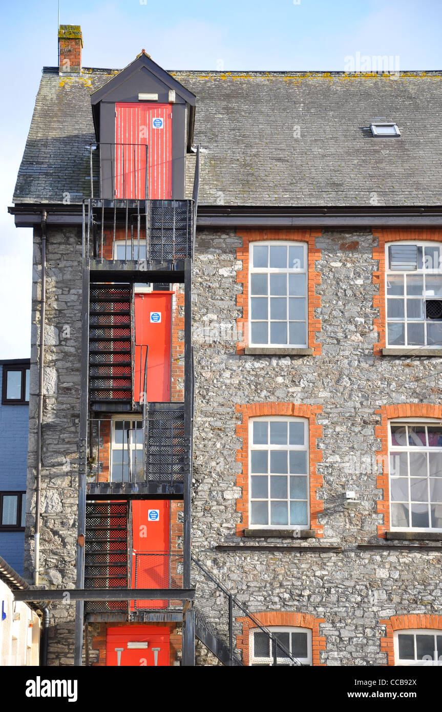 Fire exit emergency escape route on exterior of commercial building ...