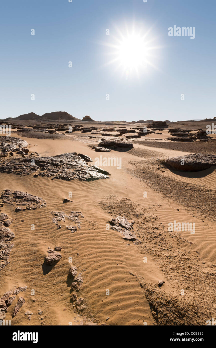 Sunsetting over the white limestone intrusion on edge of yardang field ...