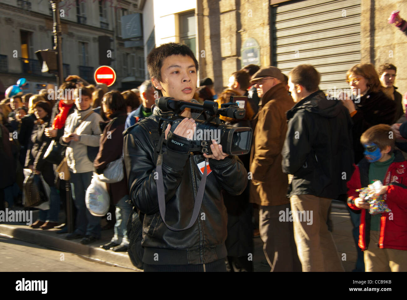 Paris, France, Chinese Man Filming Parade at Chinese new year Carnival ...