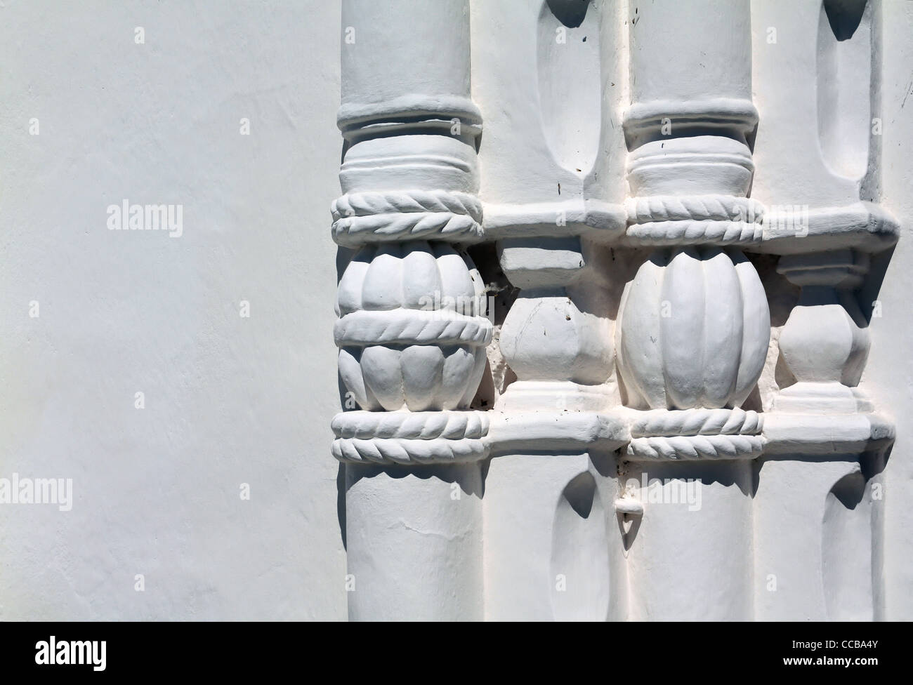 decorative elements on white wall Stock Photo - Alamy