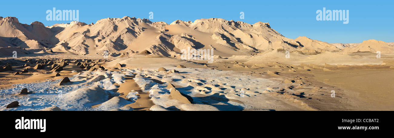 Panoramic shot of white limestone intrusion and edge of yardang field ...