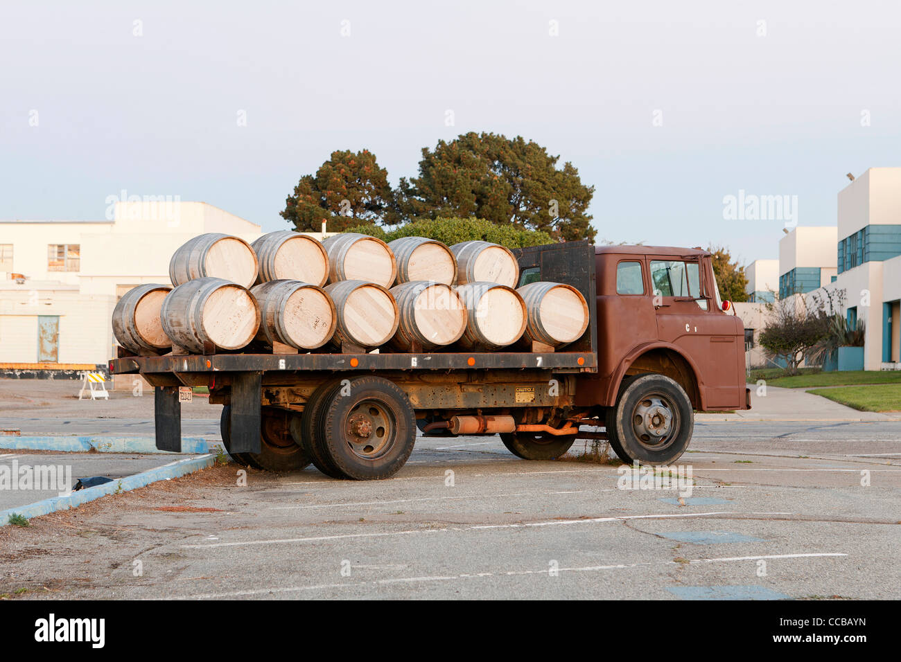 Antique flatbed truck hauling wine barrels - Central California USA ...