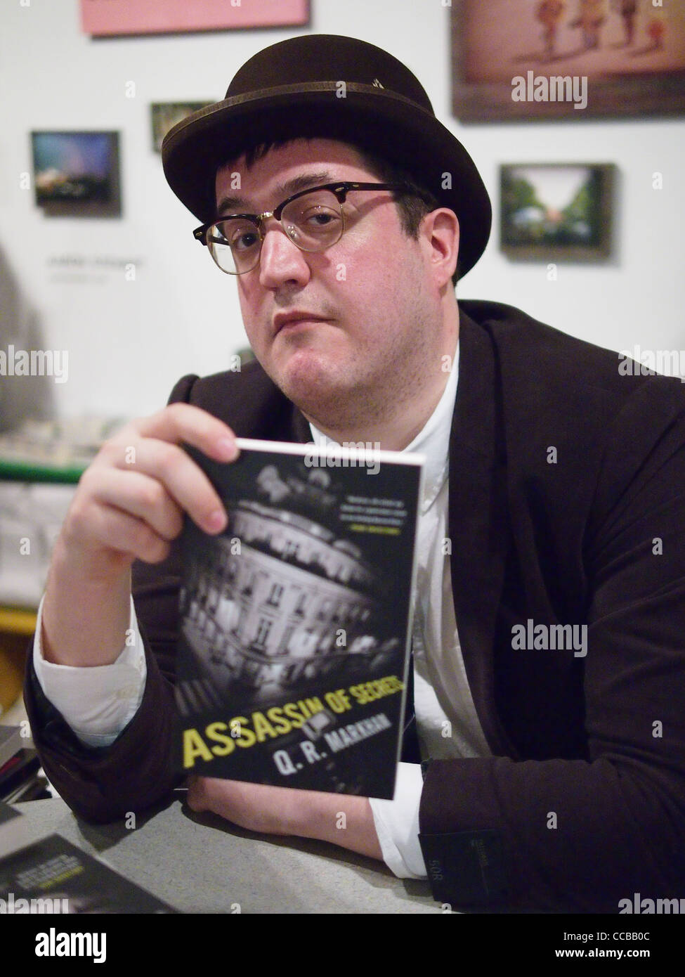 Author Quentin Rowan with copy of his spy novel, "Assassin of Secrets ...