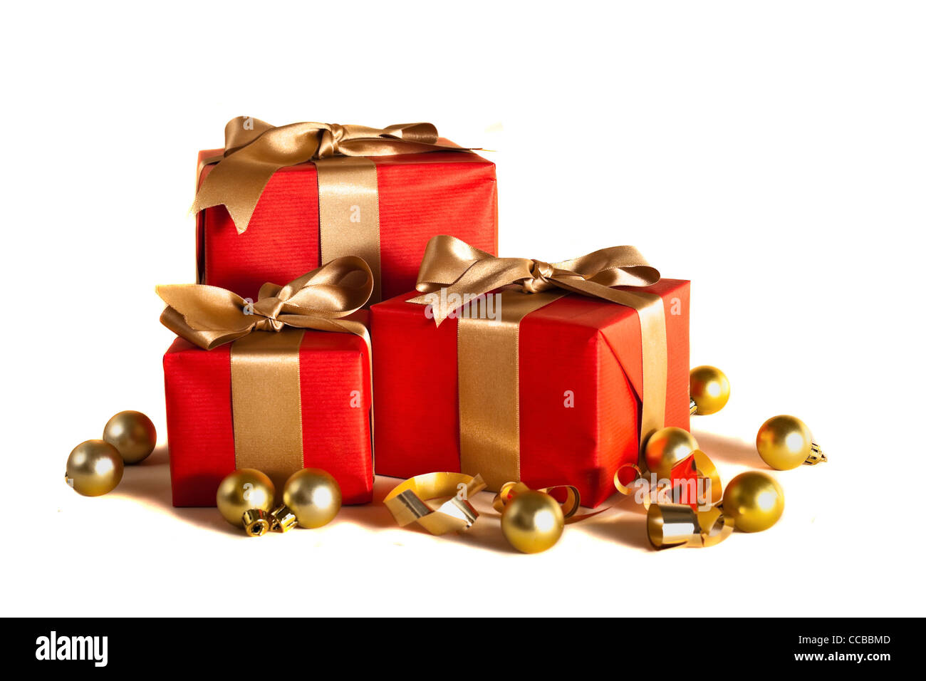 Red Presents and Golden Christmas Balls Stock Photo - Alamy