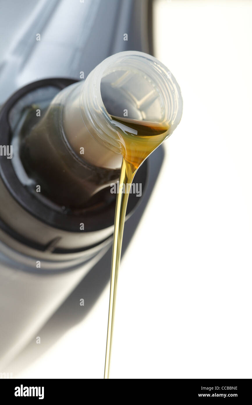 Can with car engine oil isolated on white Stock Photo - Alamy