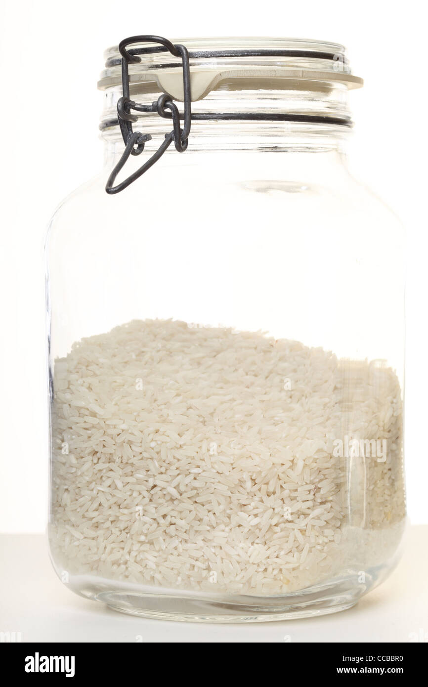 natural rice in jar on white background Stock Photo - Alamy