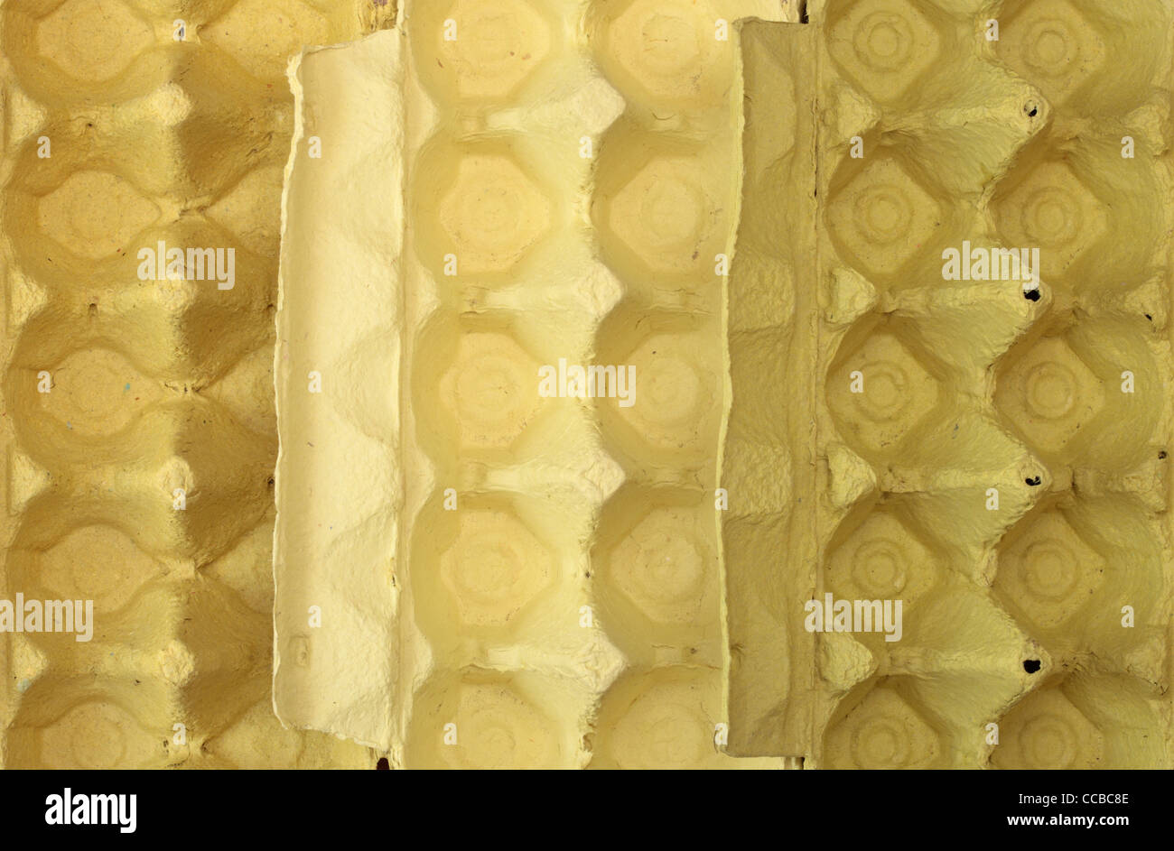 yellow egg box background texture Stock Photo - Alamy