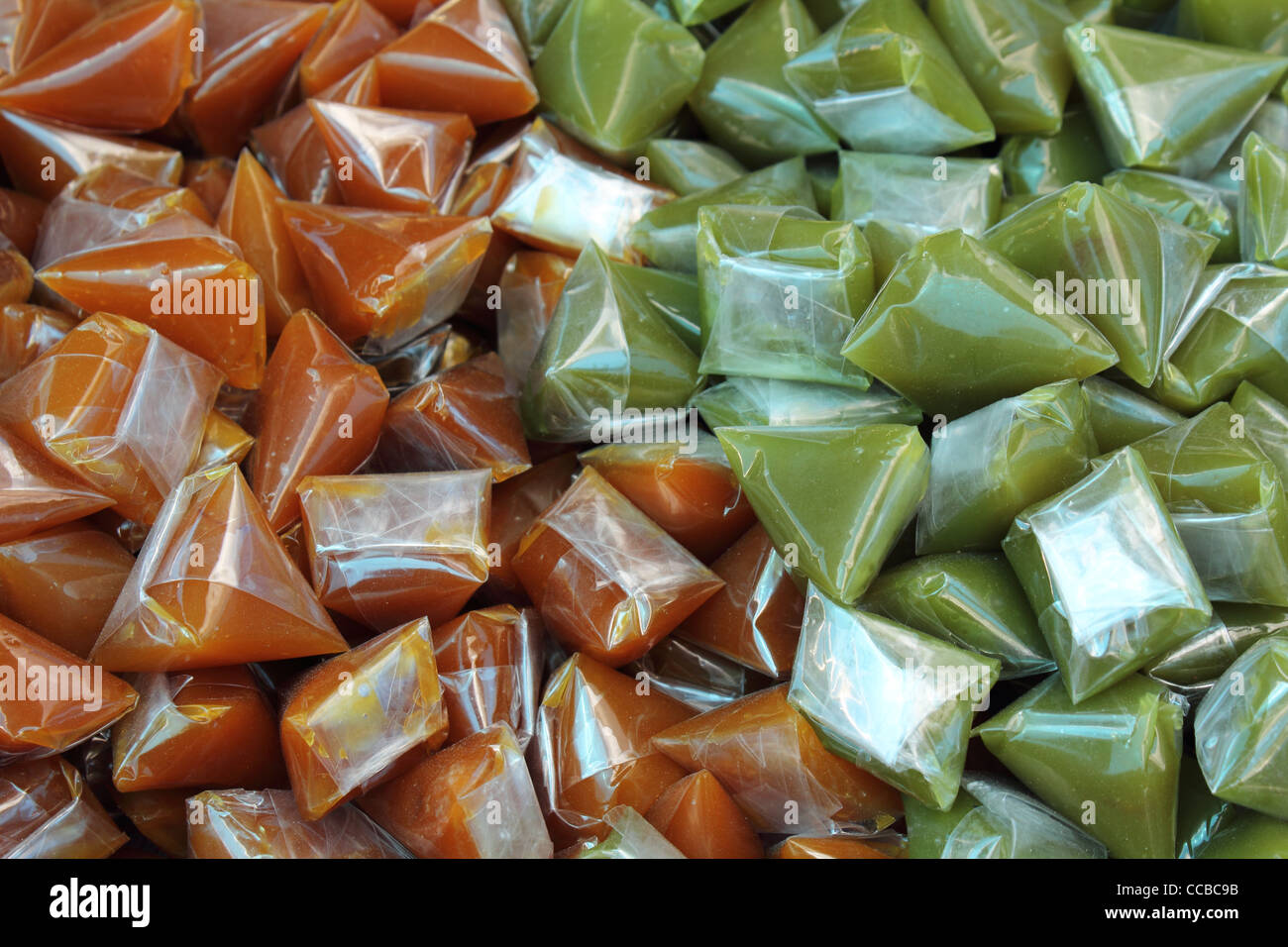 Background of Thai dessert made from flour and sugar in triangle ...