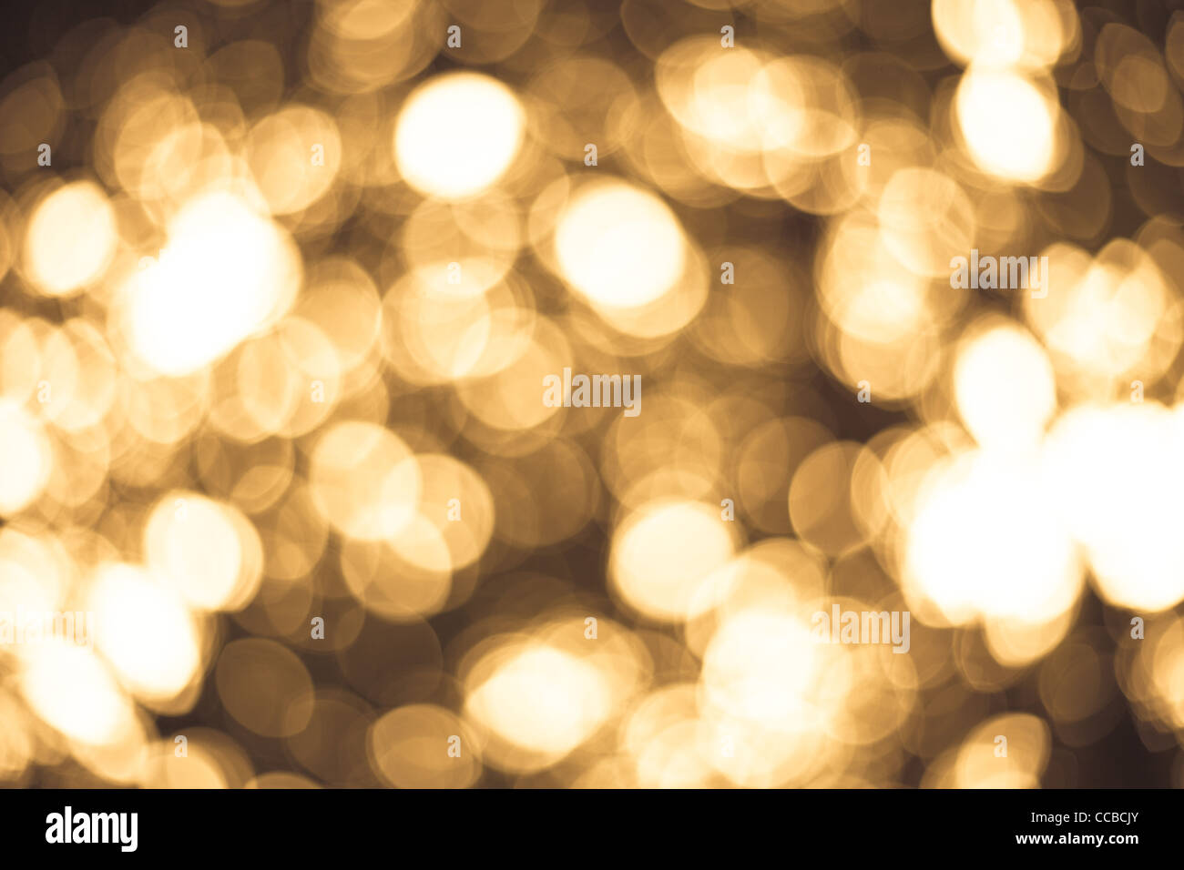 Golden background with light dots hi-res stock photography and images ...