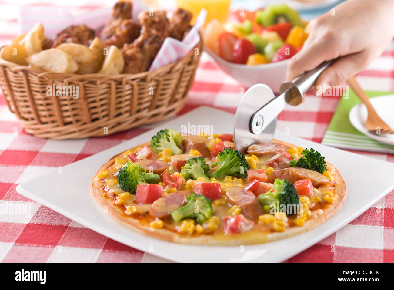 Holding pizza cutter hi-res stock photography and images - Alamy