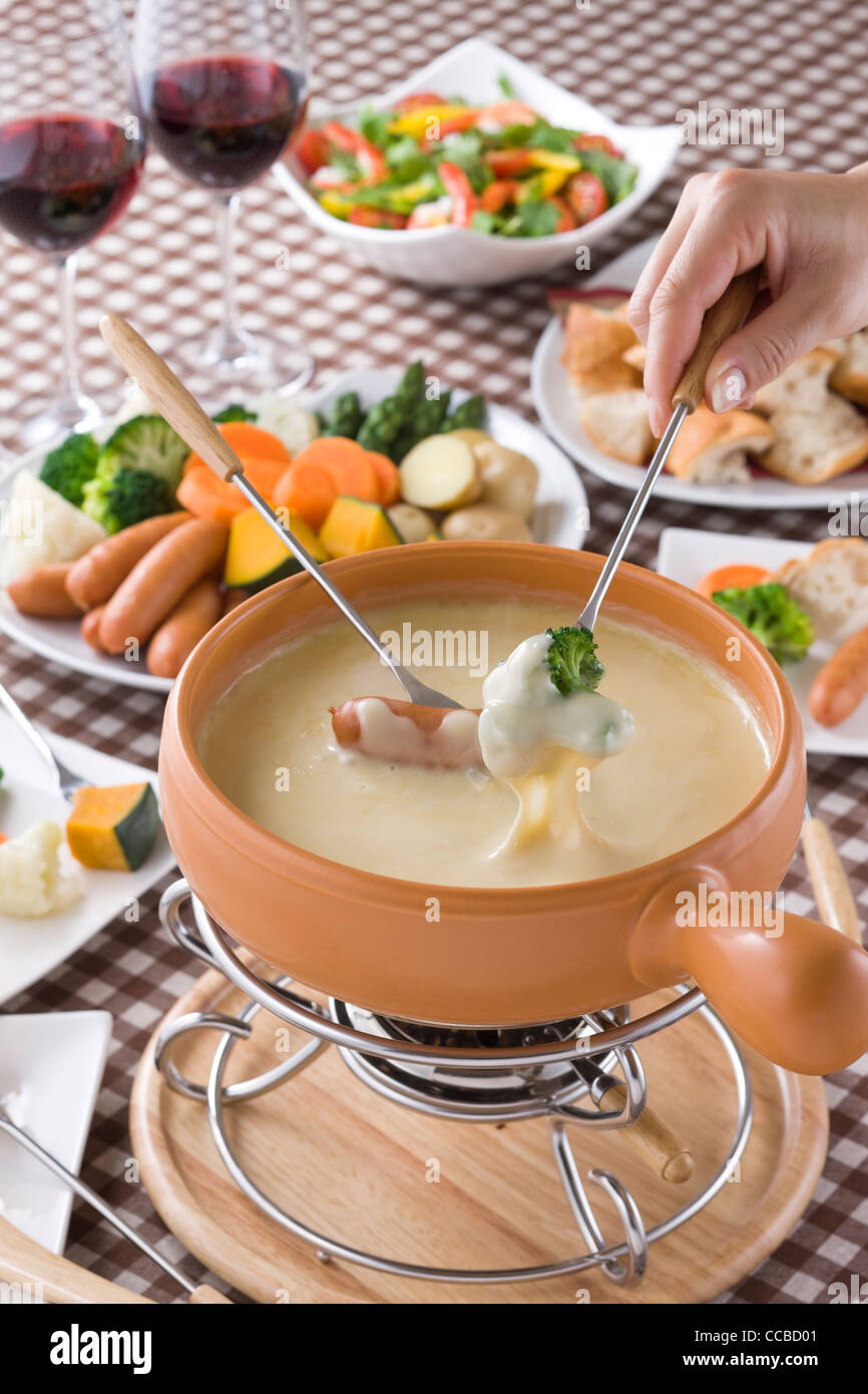 Cheese fondue hi-res stock photography and images - Alamy