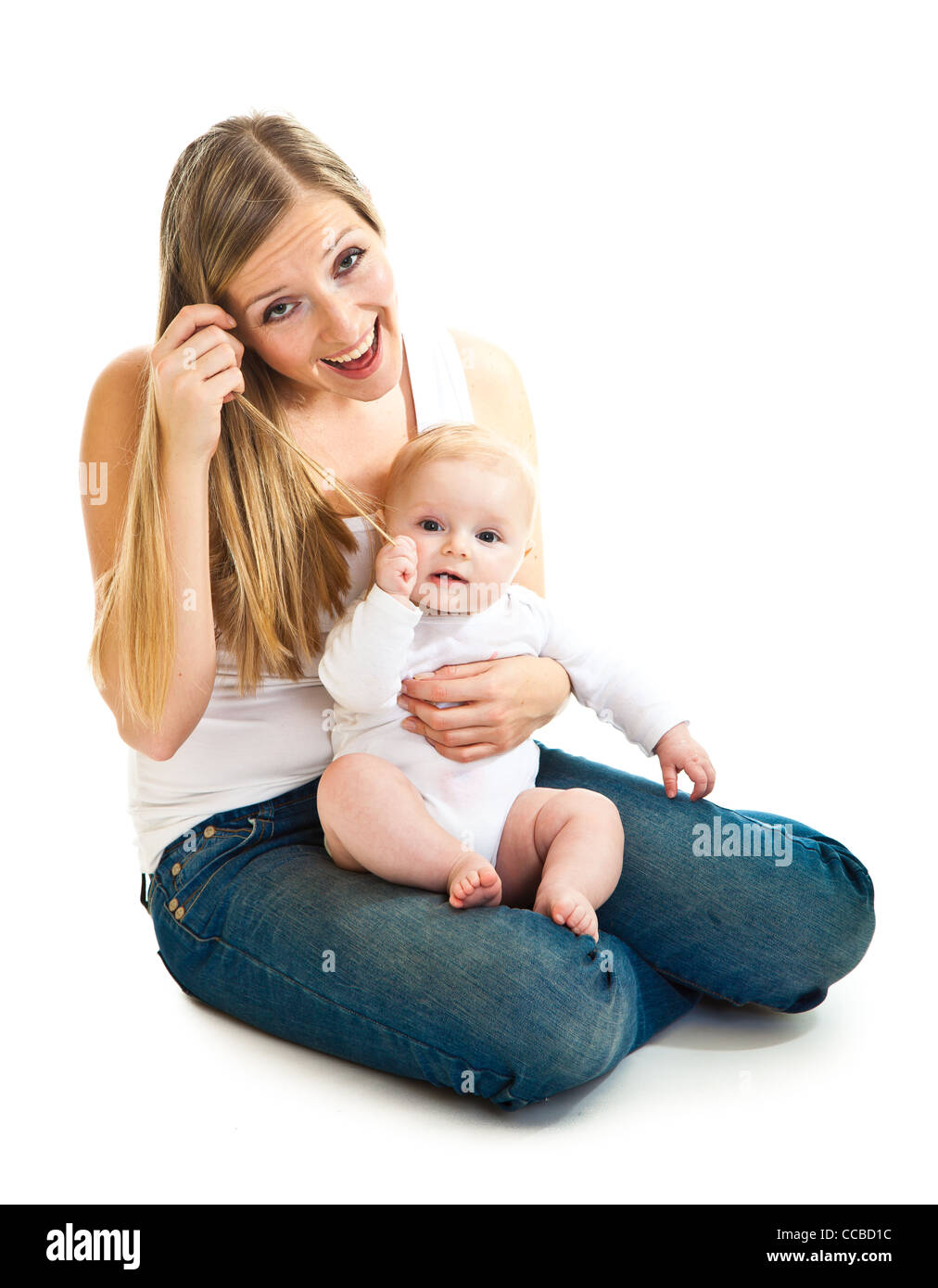 Mother giving vitamin D to infant baby girl Stock Photo - Alamy