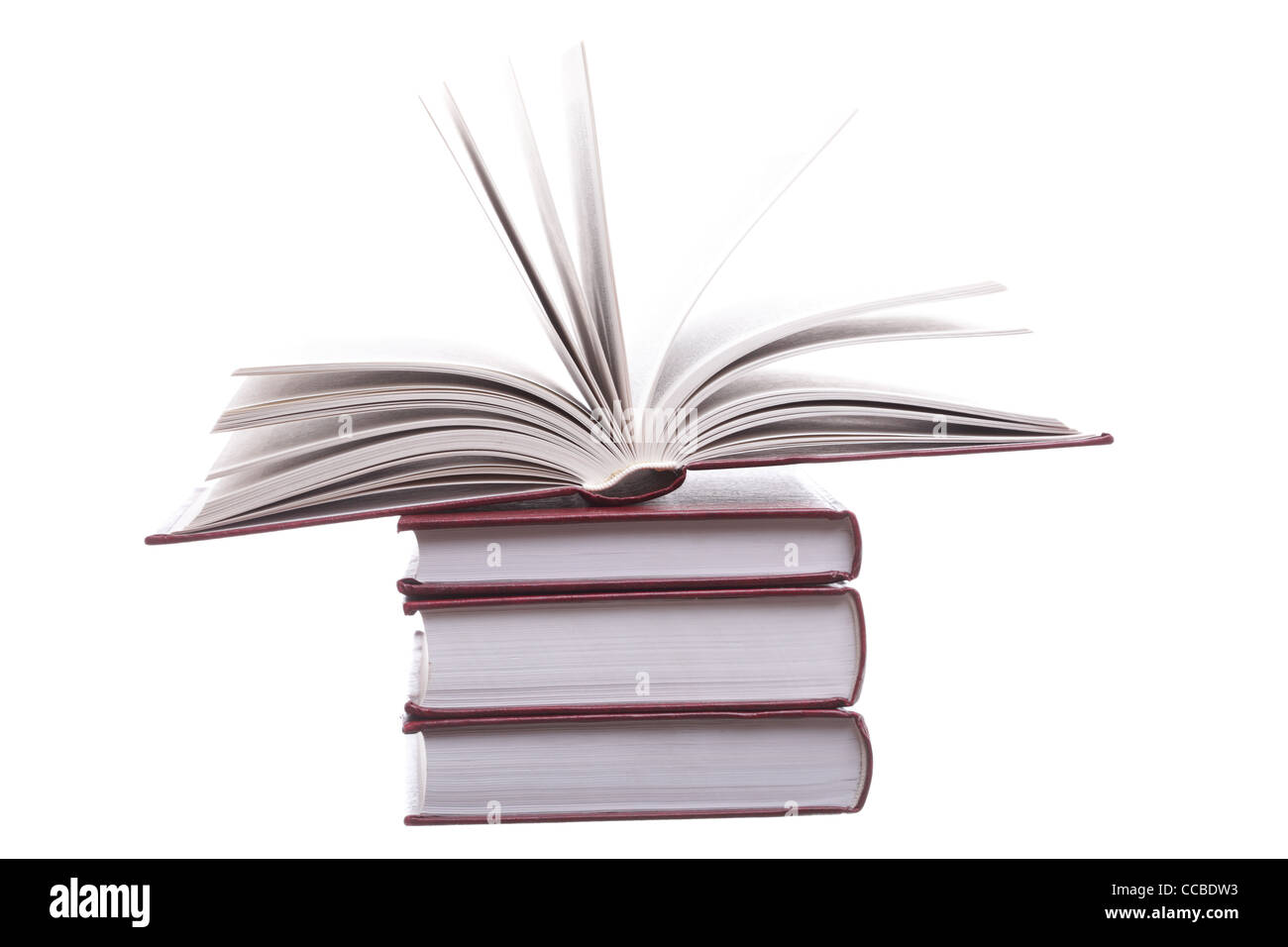 Isolated on white stack red book library object Stock Photo - Alamy