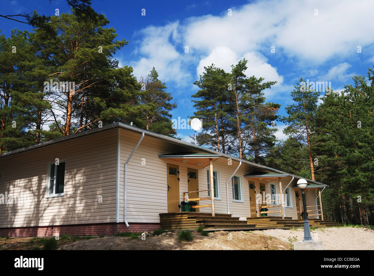 summer cozy cottage in northern pine wood Stock Photo - Alamy
