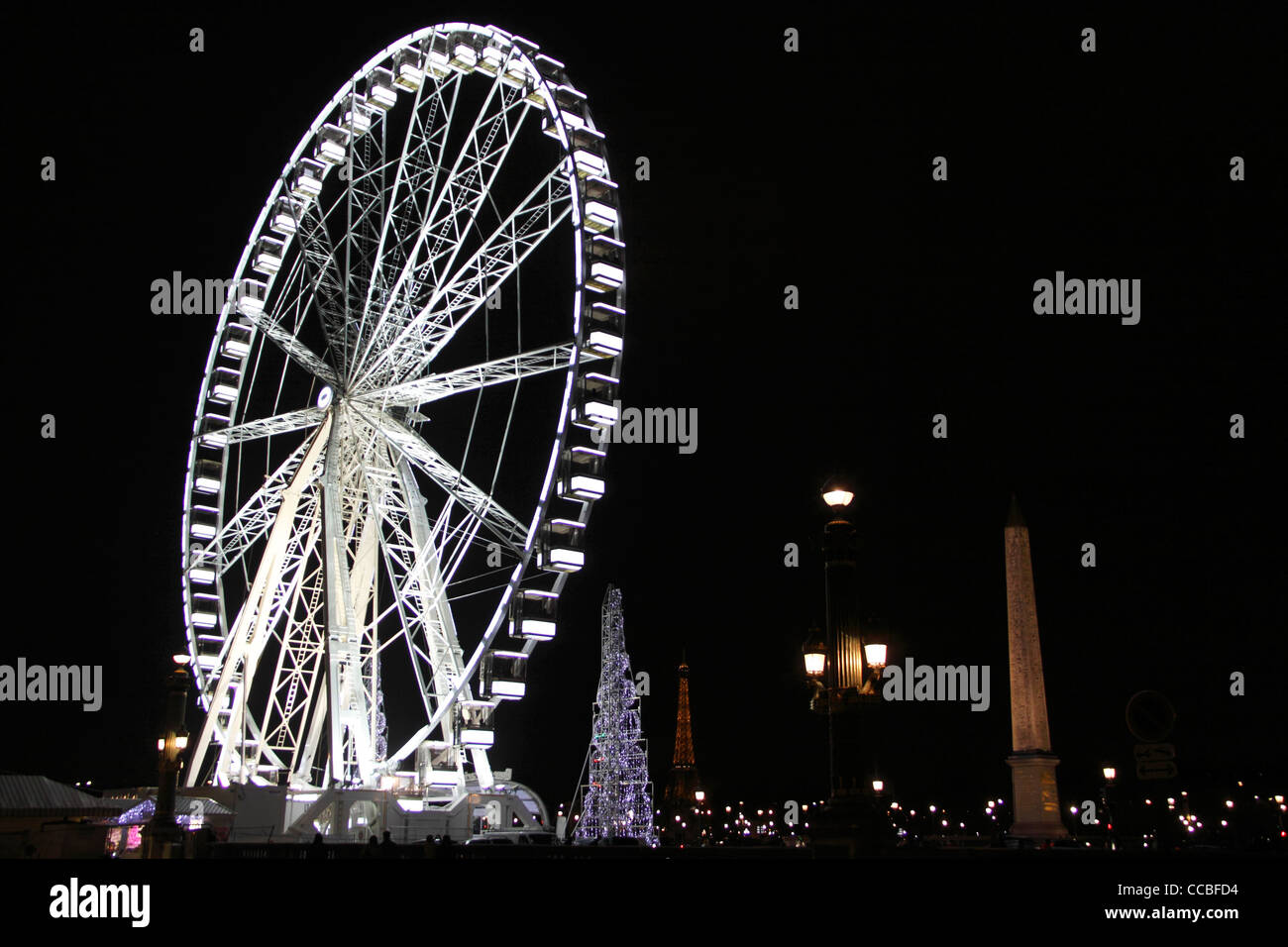 Place de la Concorde, Christmas Ferris wheel by night, and view of the ...