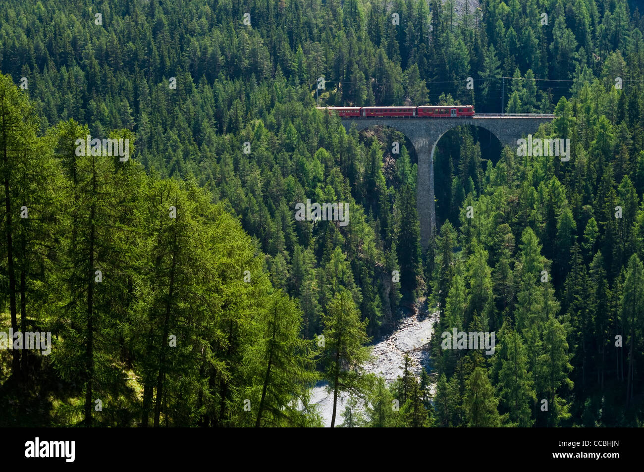 train on viaduct, brail, switzerland Stock Photo - Alamy