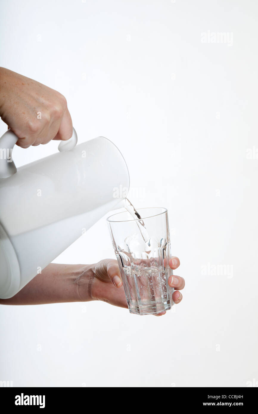 Jug pouring water glass hi-res stock photography and images - Alamy