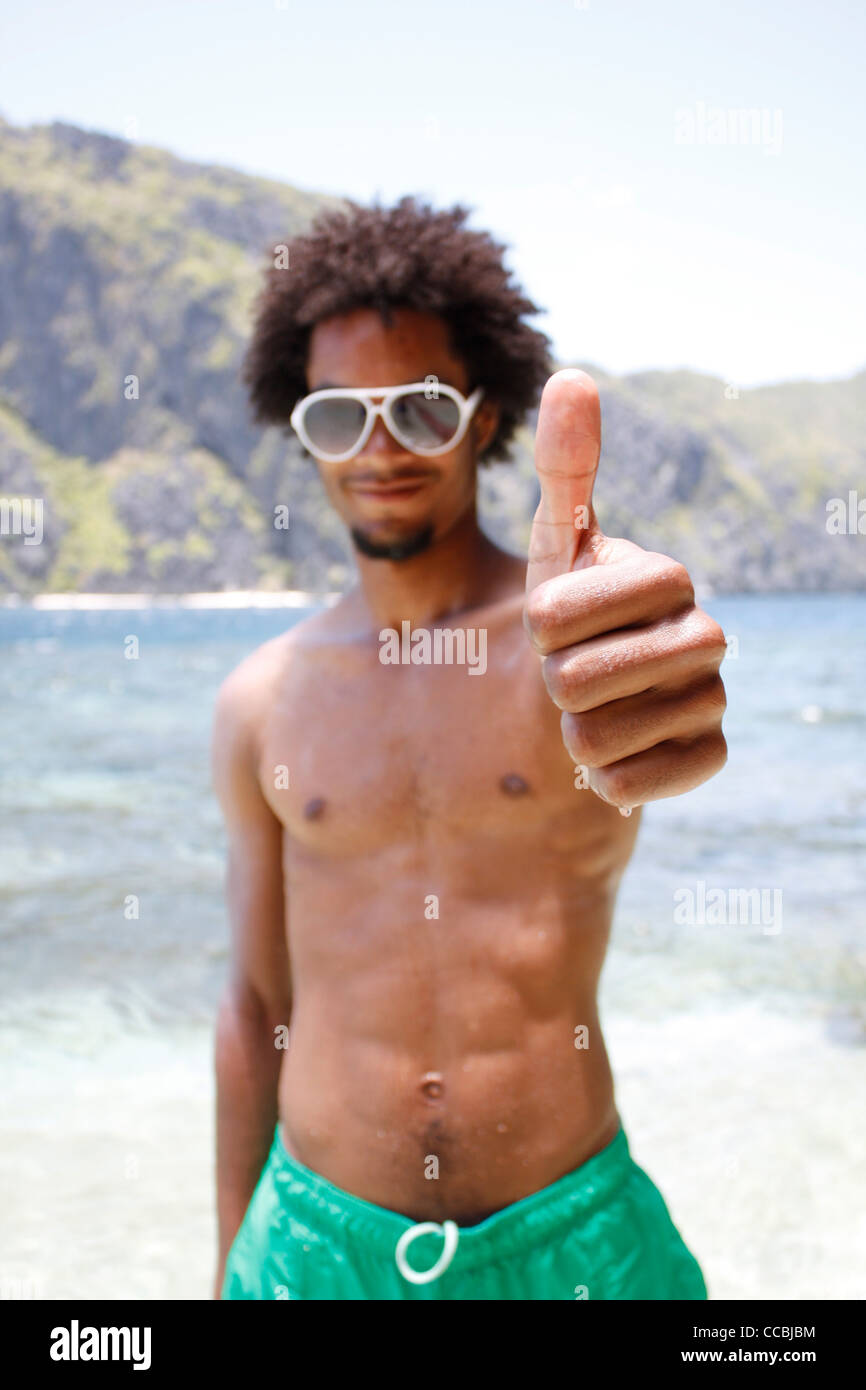 Happy guy on the beach Stock Photo - Alamy