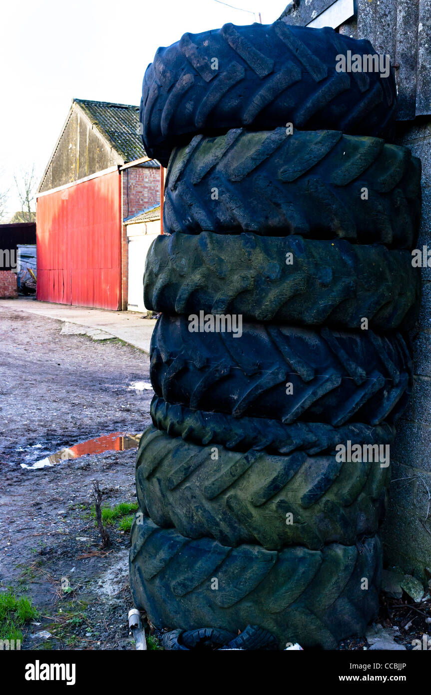 A pile of tractor tyres on a farm Stock Photo - Alamy