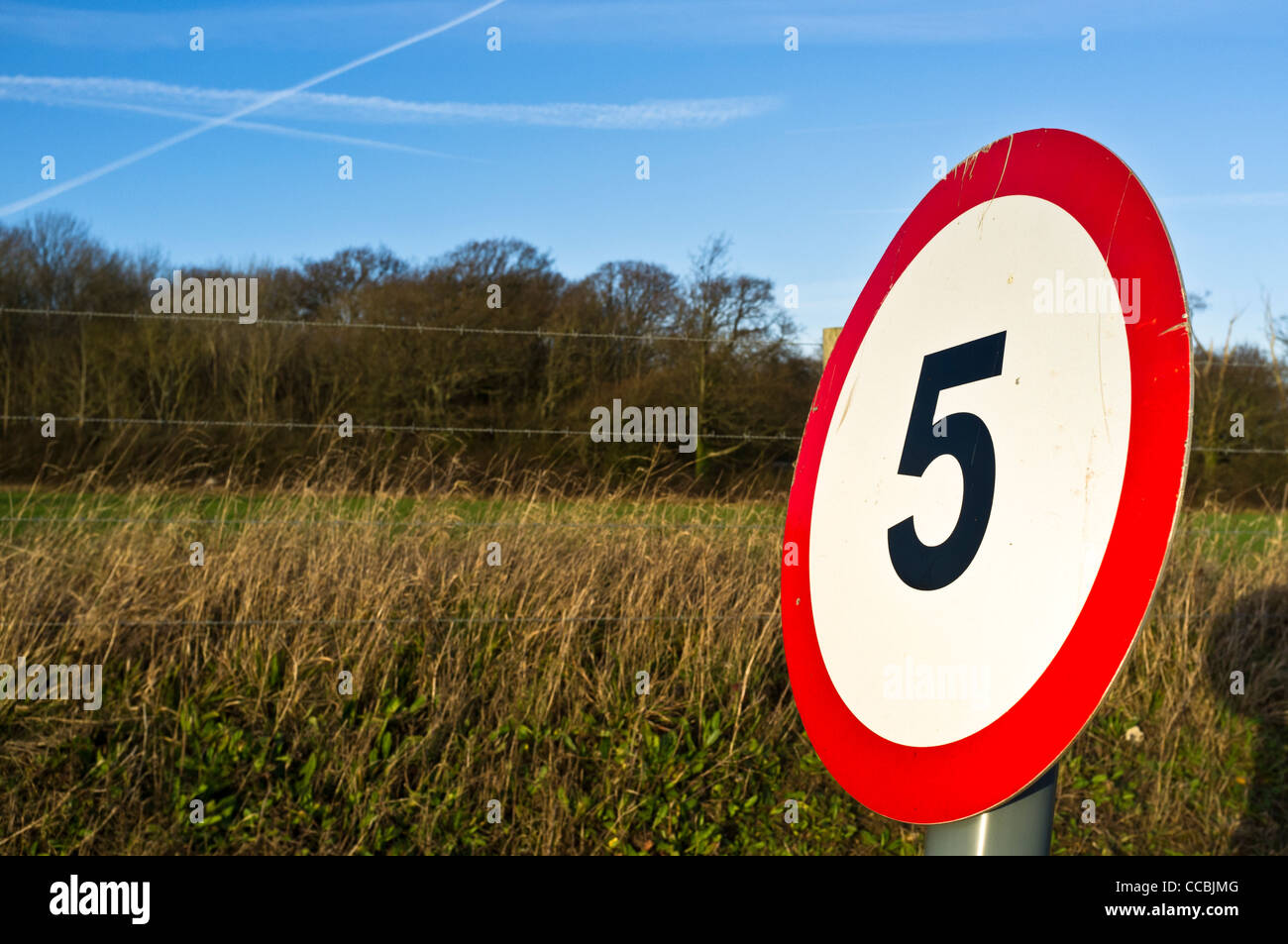 A 5 MPH speed limit sign in the UK countryside Stock Photo - Alamy