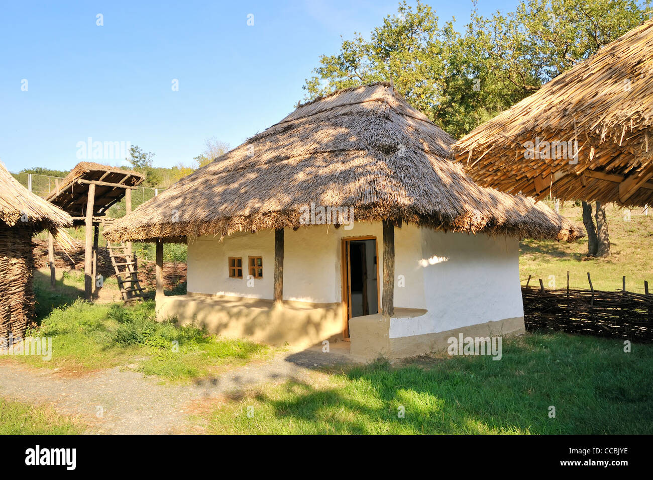 traditional rural cottage with a straw roof Stock Photo - Alamy