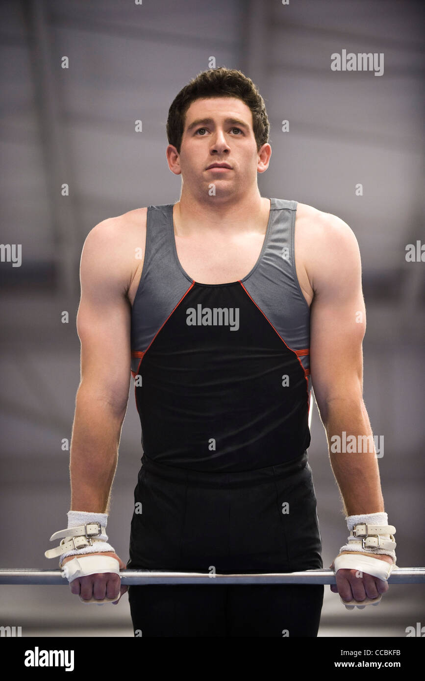Male gymnast on horizontal bar Stock Photo - Alamy
