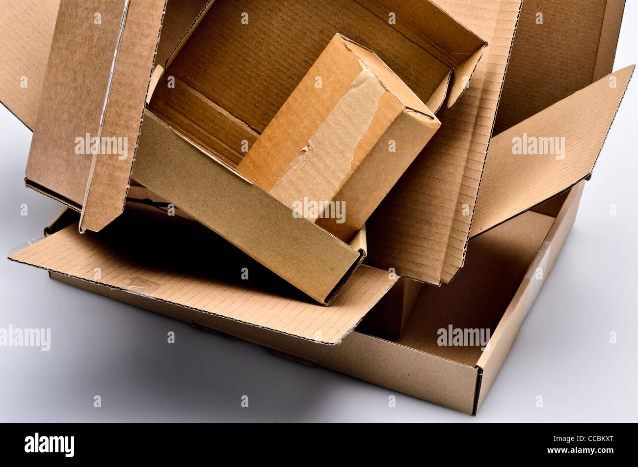 Cardboard boxes stacked Stock Photo - Alamy