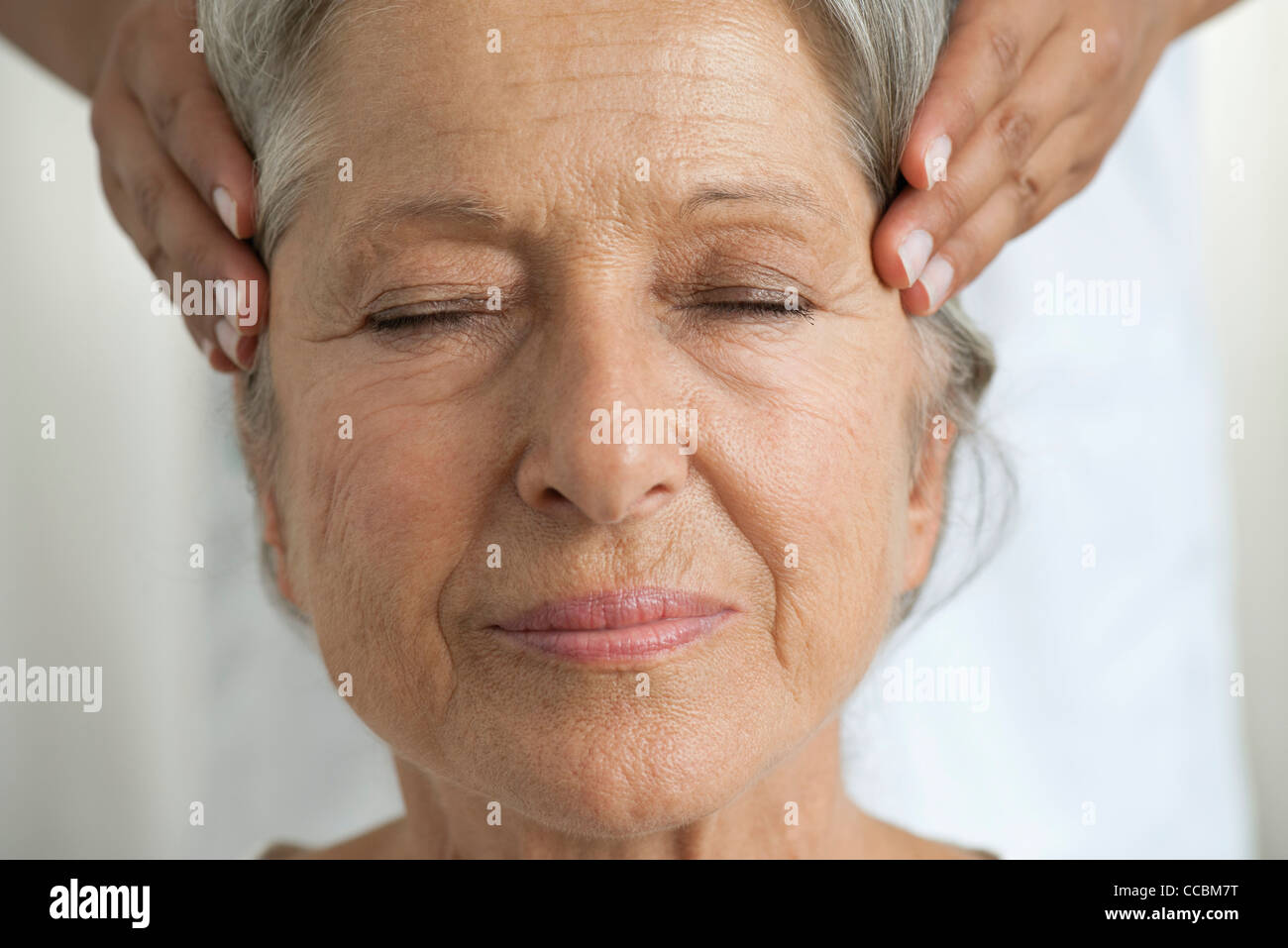 Being massaged hands hi-res stock photography and images - Alamy