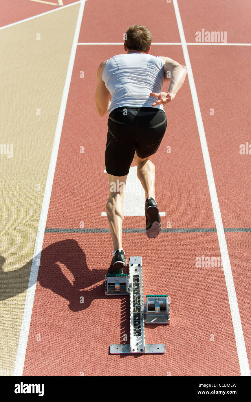 Runner at starting line, rear view Stock Photo - Alamy Runner at starting line, rear view Stock Photo - Alamy