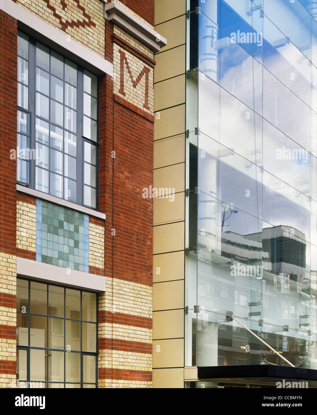 MICHELIN BUILDING FACADE DETAIL; GLASS/BRICK JUXTAPOSITION Stock Photo ...