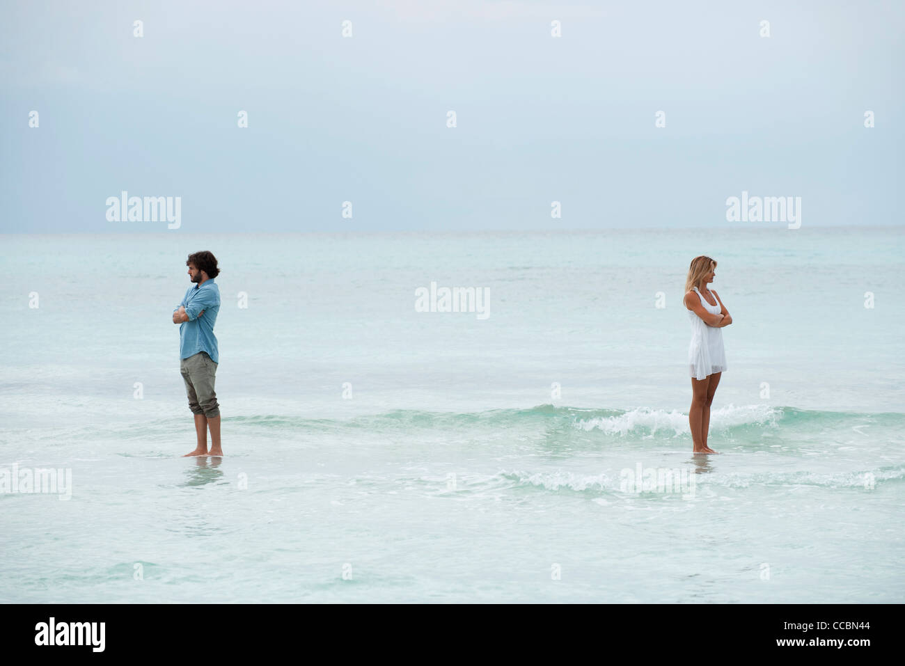 Two People Standing Apart