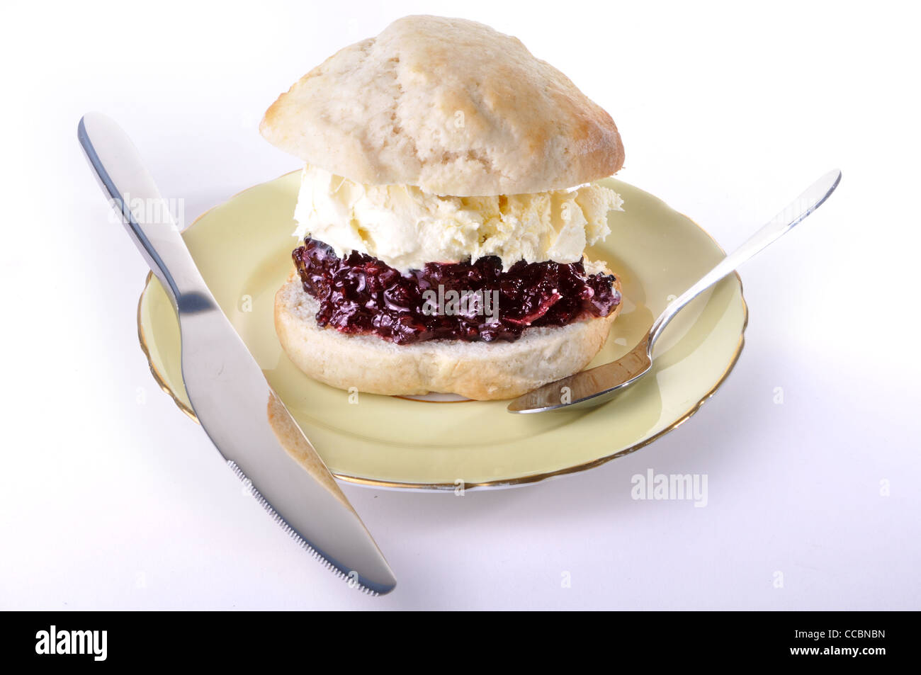 Scone with clotted cream and strawberry jam, afternoon cream tea Stock ...