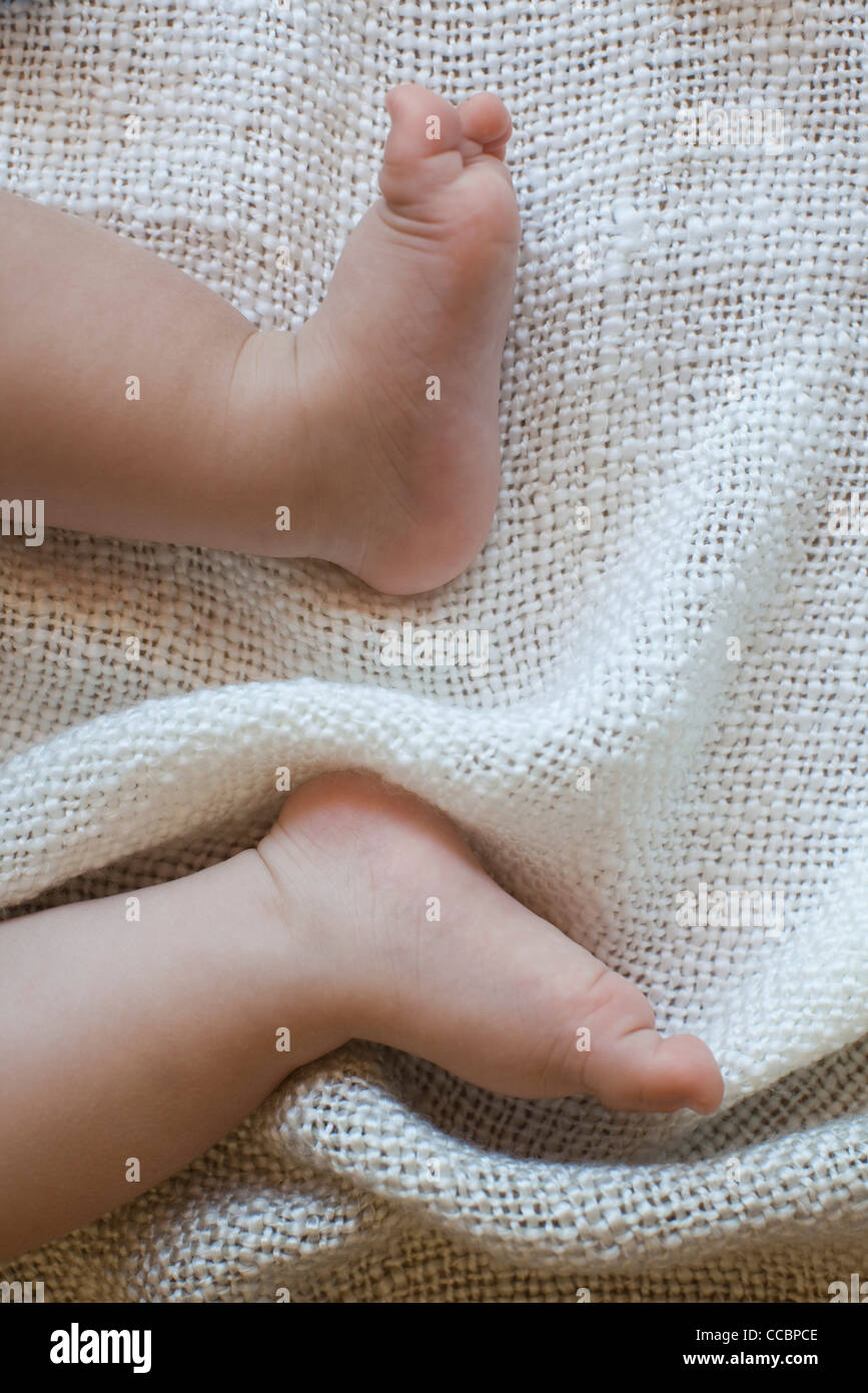 Baby's feet, directly above view Stock Photo - Alamy