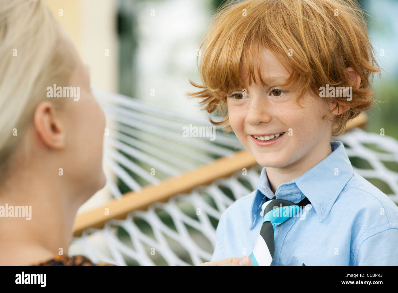 Mother tying son's tie hi-res stock photography and images - Alamy