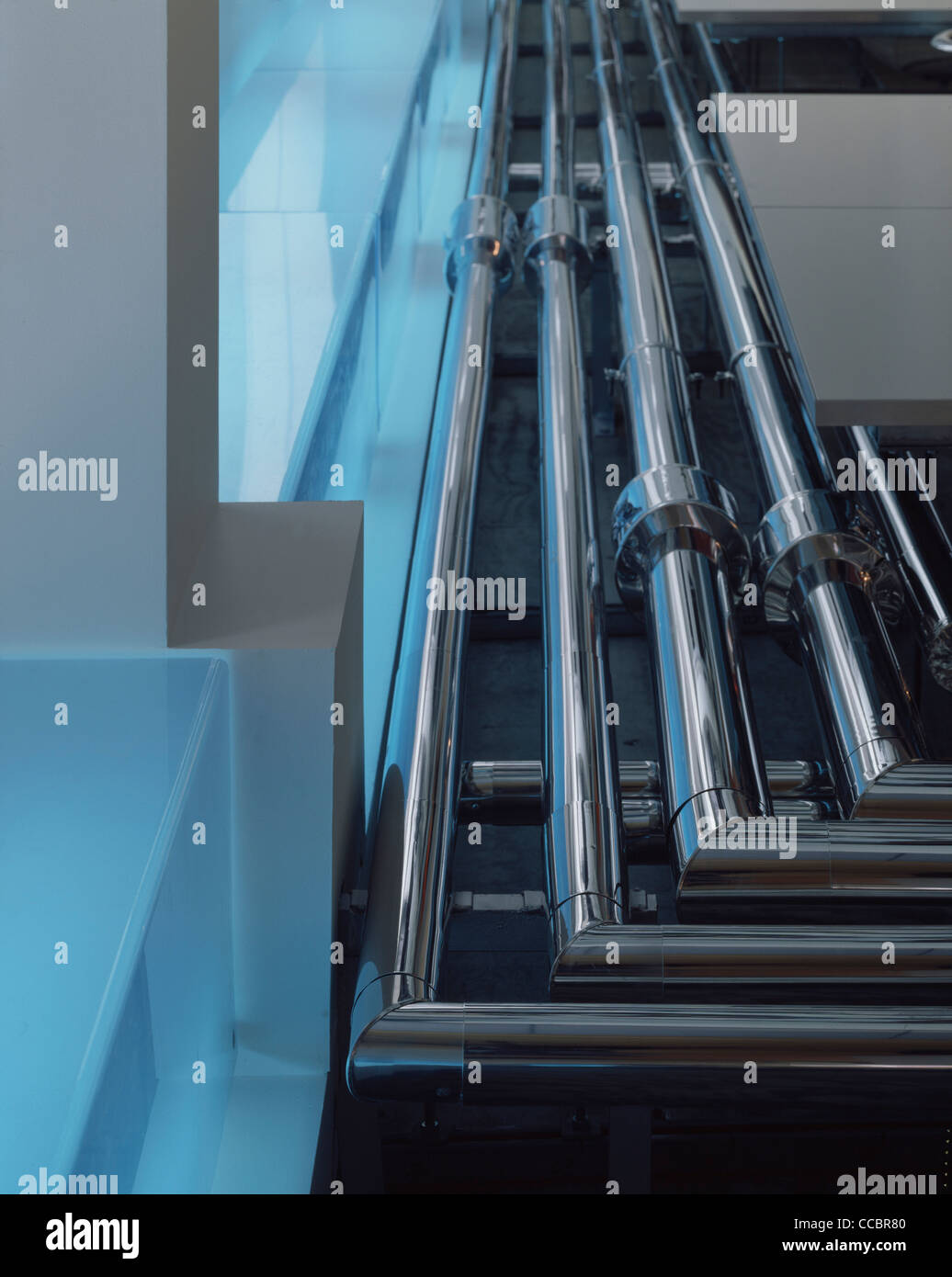 emi offices detail of polished ductwork and blue lighting Stock Photo ...