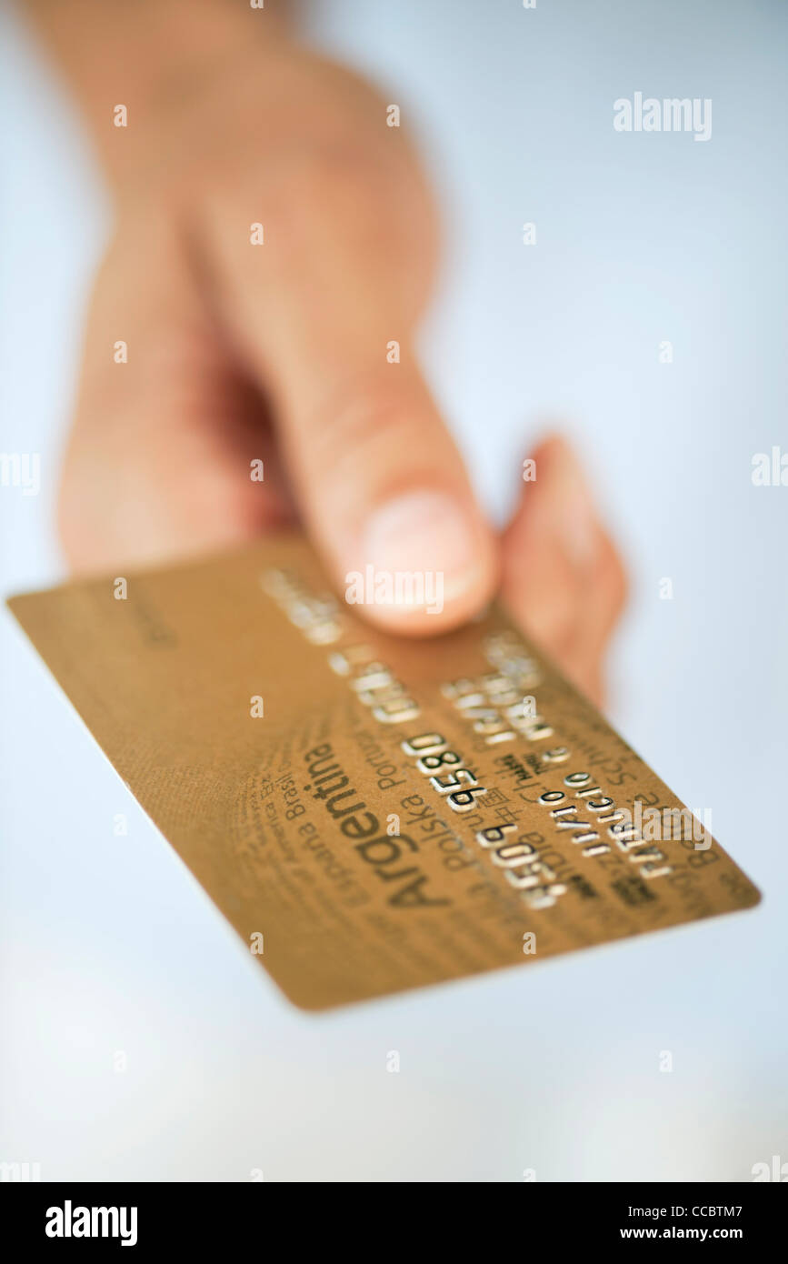 Hand holding credit card Stock Photo - Alamy