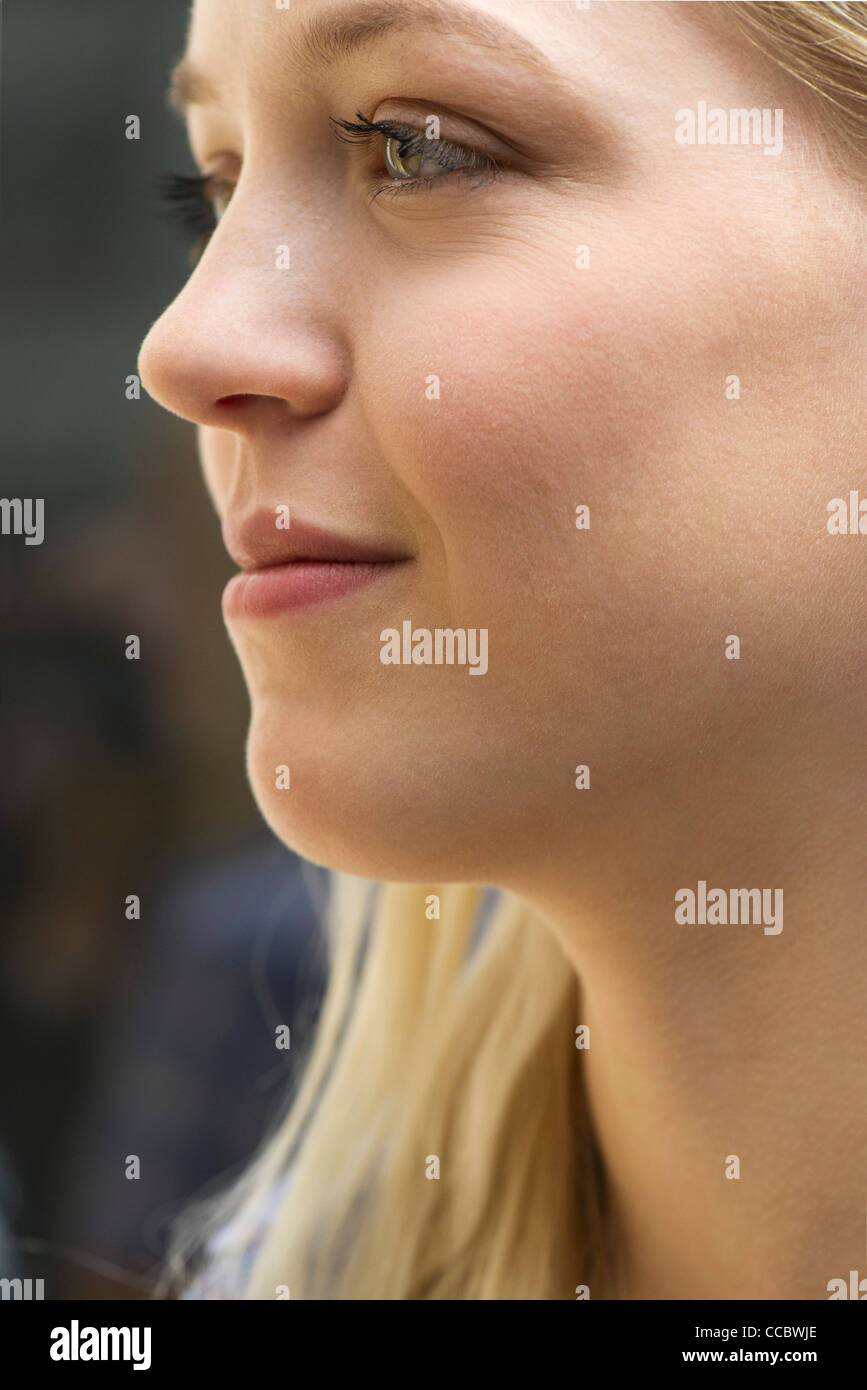 Young woman in profile, portrait Stock Photo - Alamy