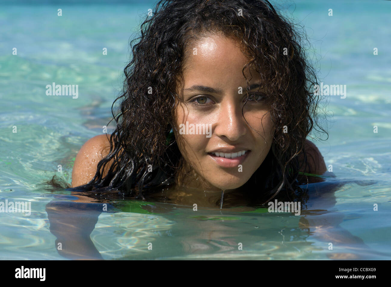 Young woman in water, portrait Stock Photo - Alamy