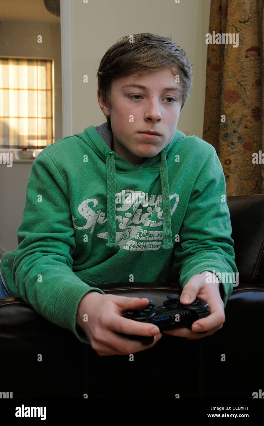 Teenage Boy Playing A Computer Game Stock Photo - Alamy