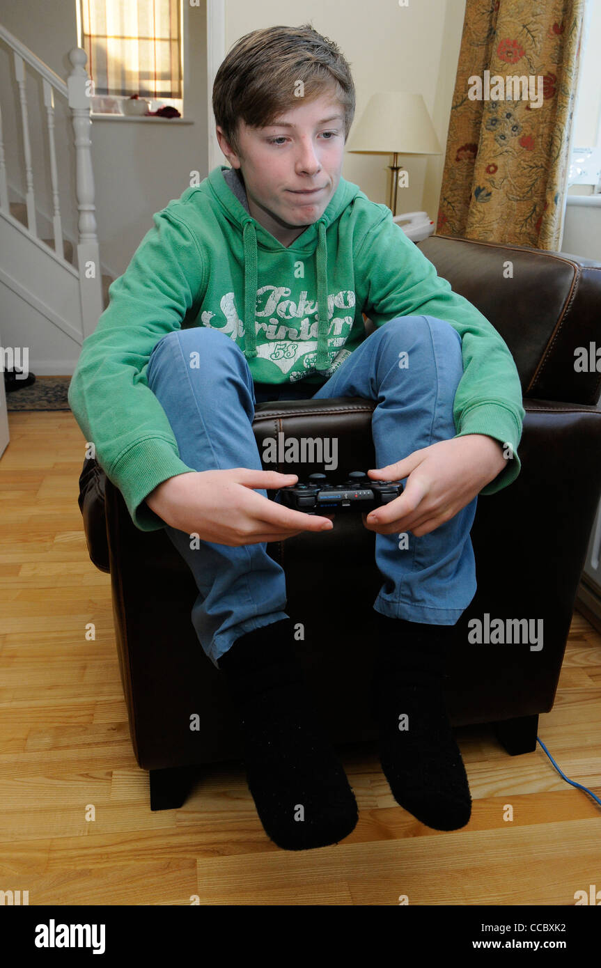 Teenage Boy Playing A Computer Game Stock Photo - Alamy