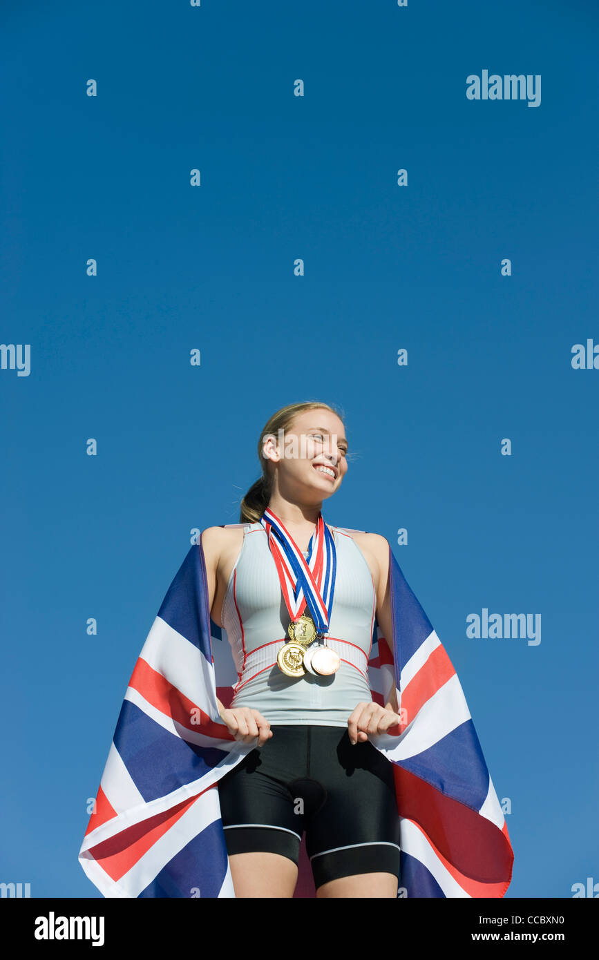 Female athlete being honored on podium Stock Photo - Alamy