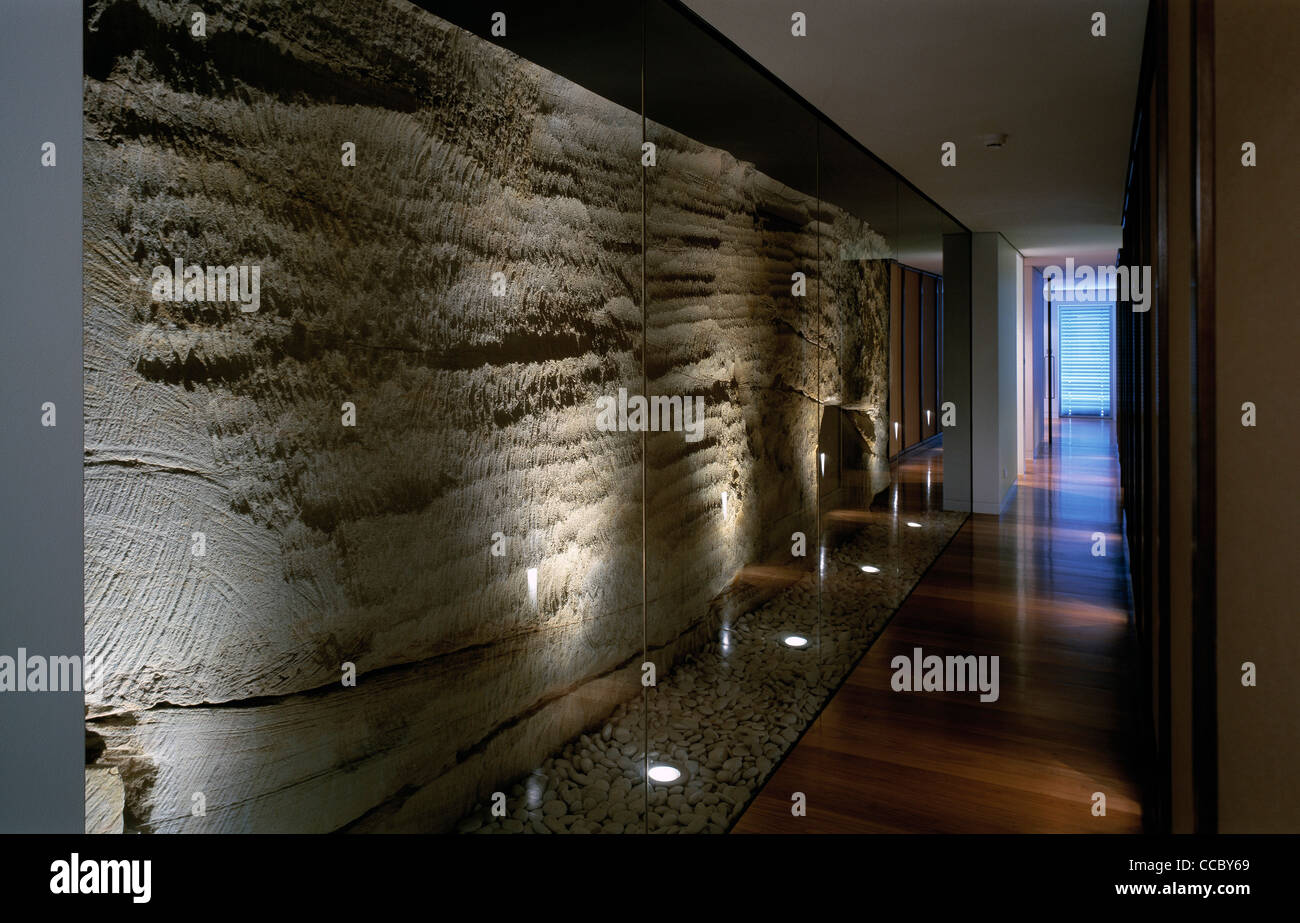 PRIVATE HOUSE CORRIDOR WITH FEATURE STONE WALL Stock Photo - Alamy