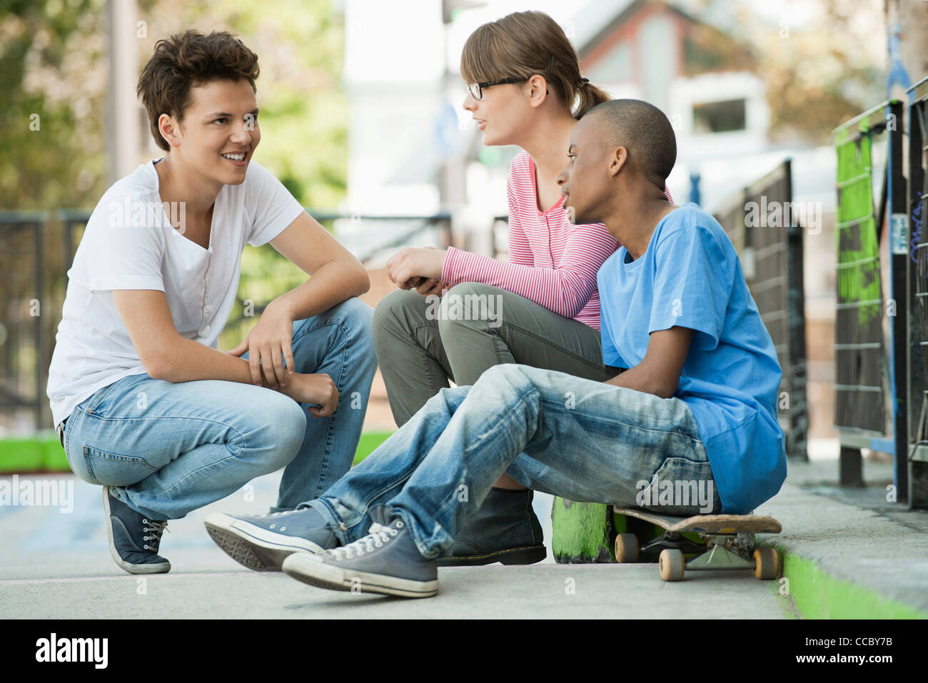 Sitting down facing out hi-res stock photography and images - Alamy