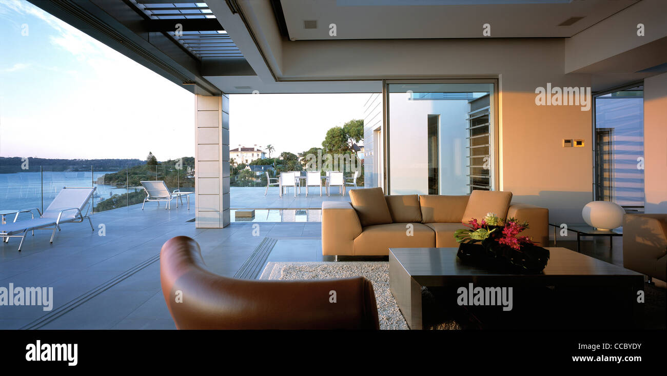 PRIVATE HOUSE LIVING ROOM OPEN TO TERRACE + VIEW Stock Photo - Alamy