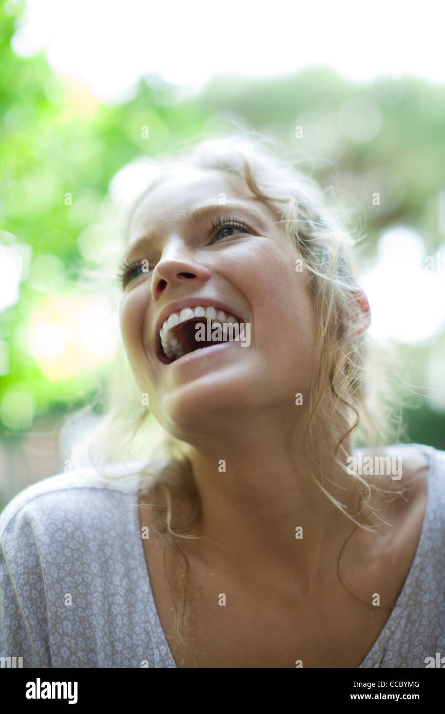 Young woman laughing, portrait Stock Photo - Alamy