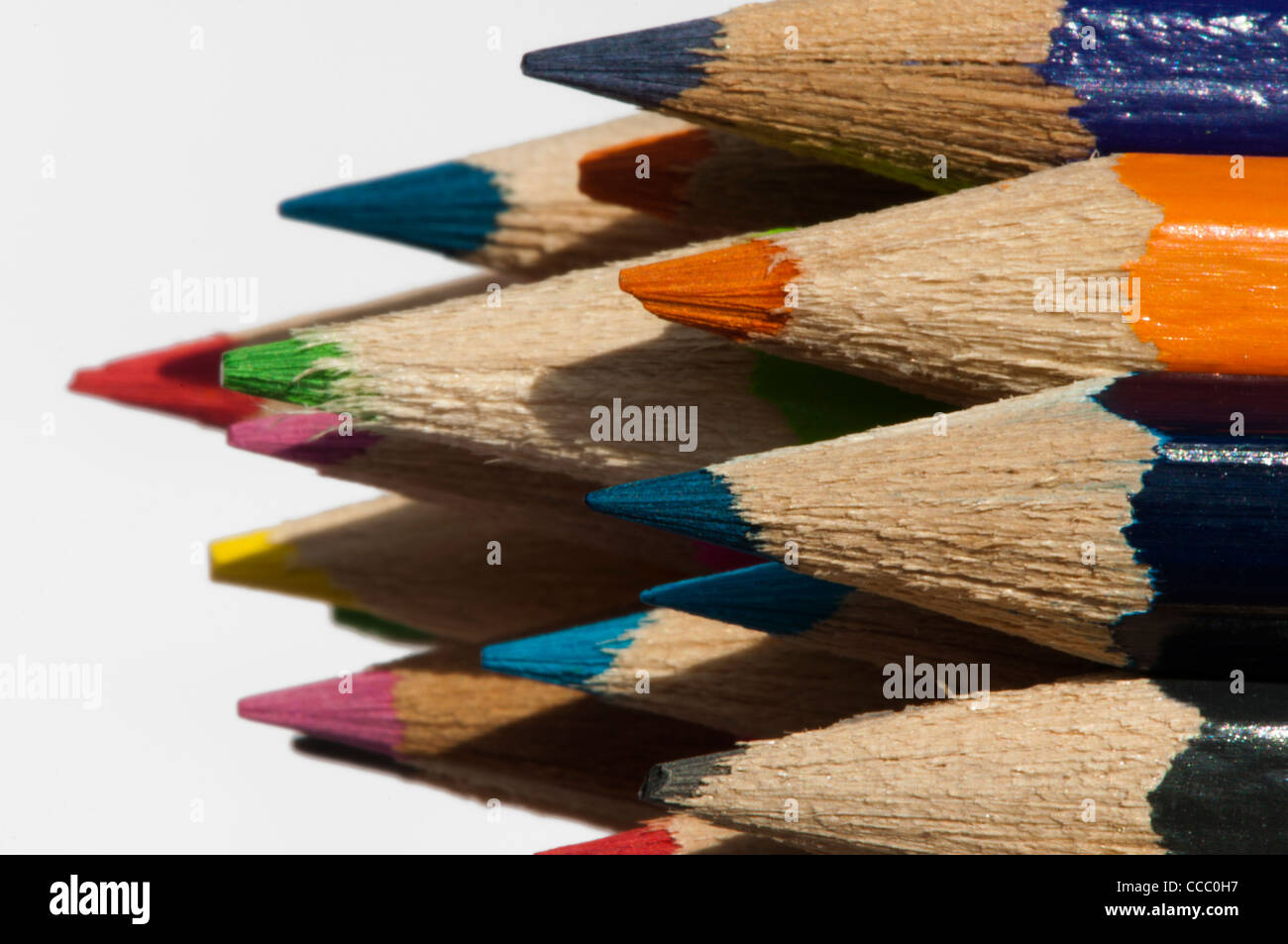 Multicolored pencils arranged as background Stock Photo - Alamy