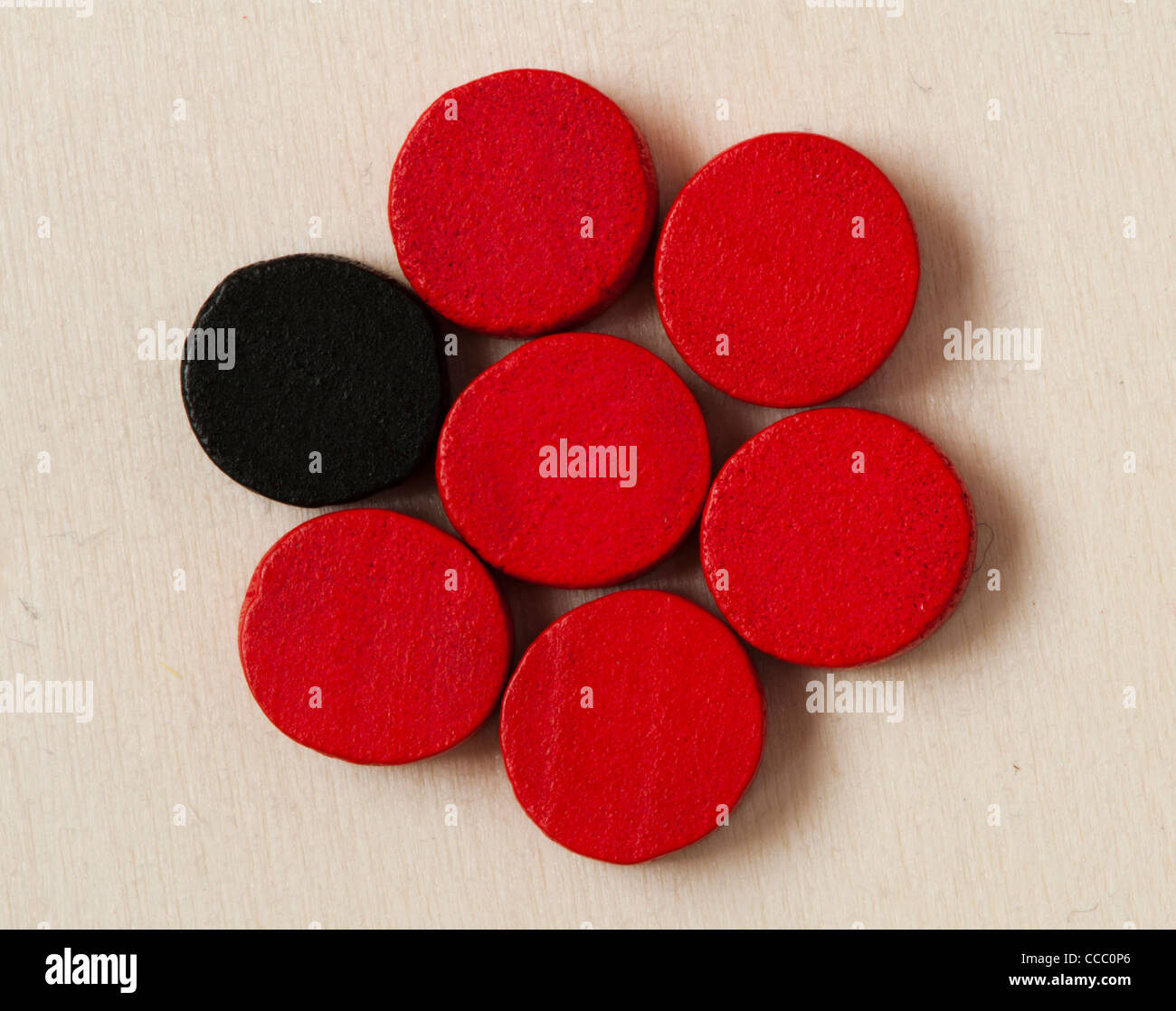 Concept of uniqueness and leadership with red and black checkers Stock ...