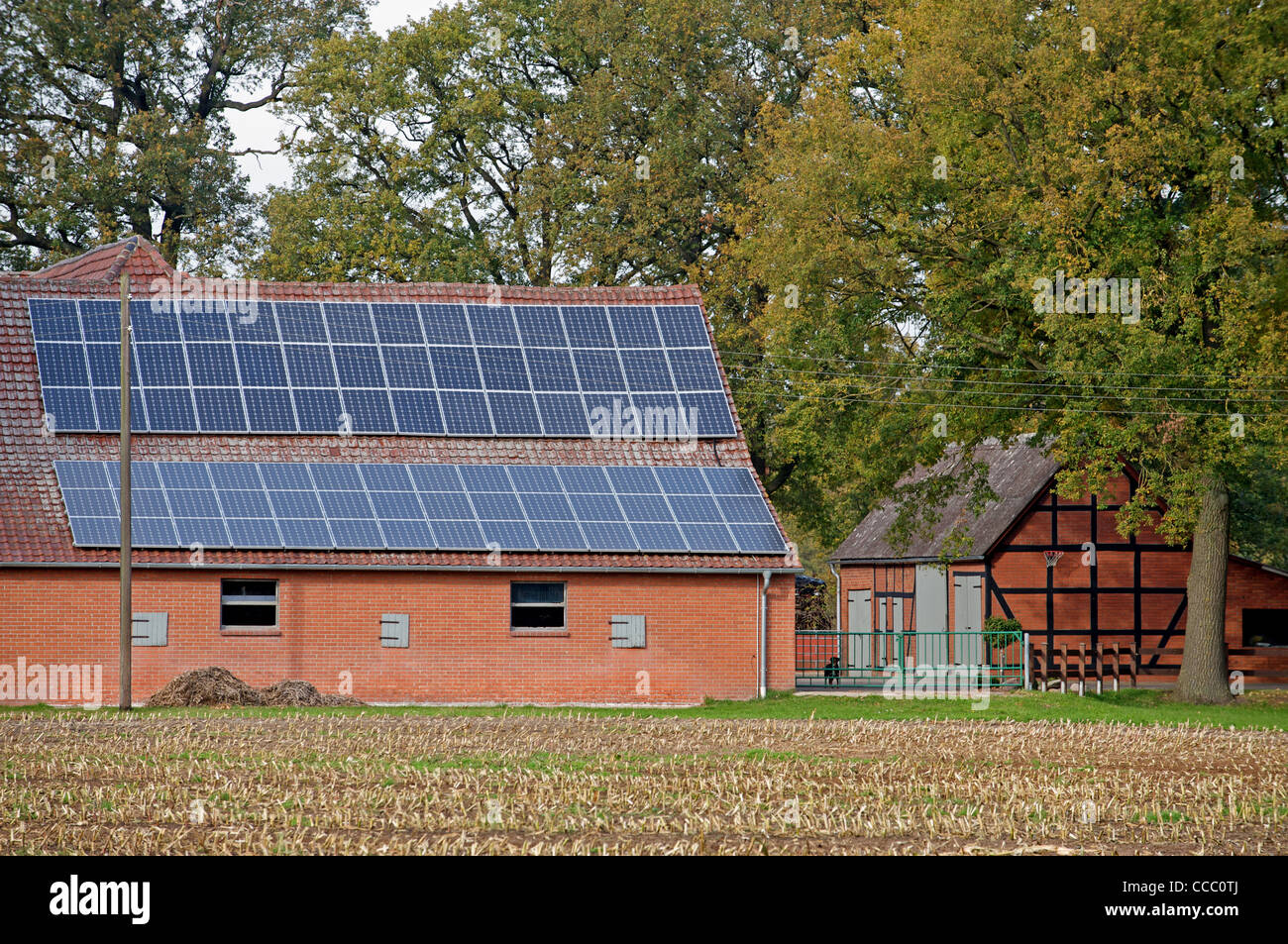 Farm buildings fitted with solar panels Stock Photo - Alamy